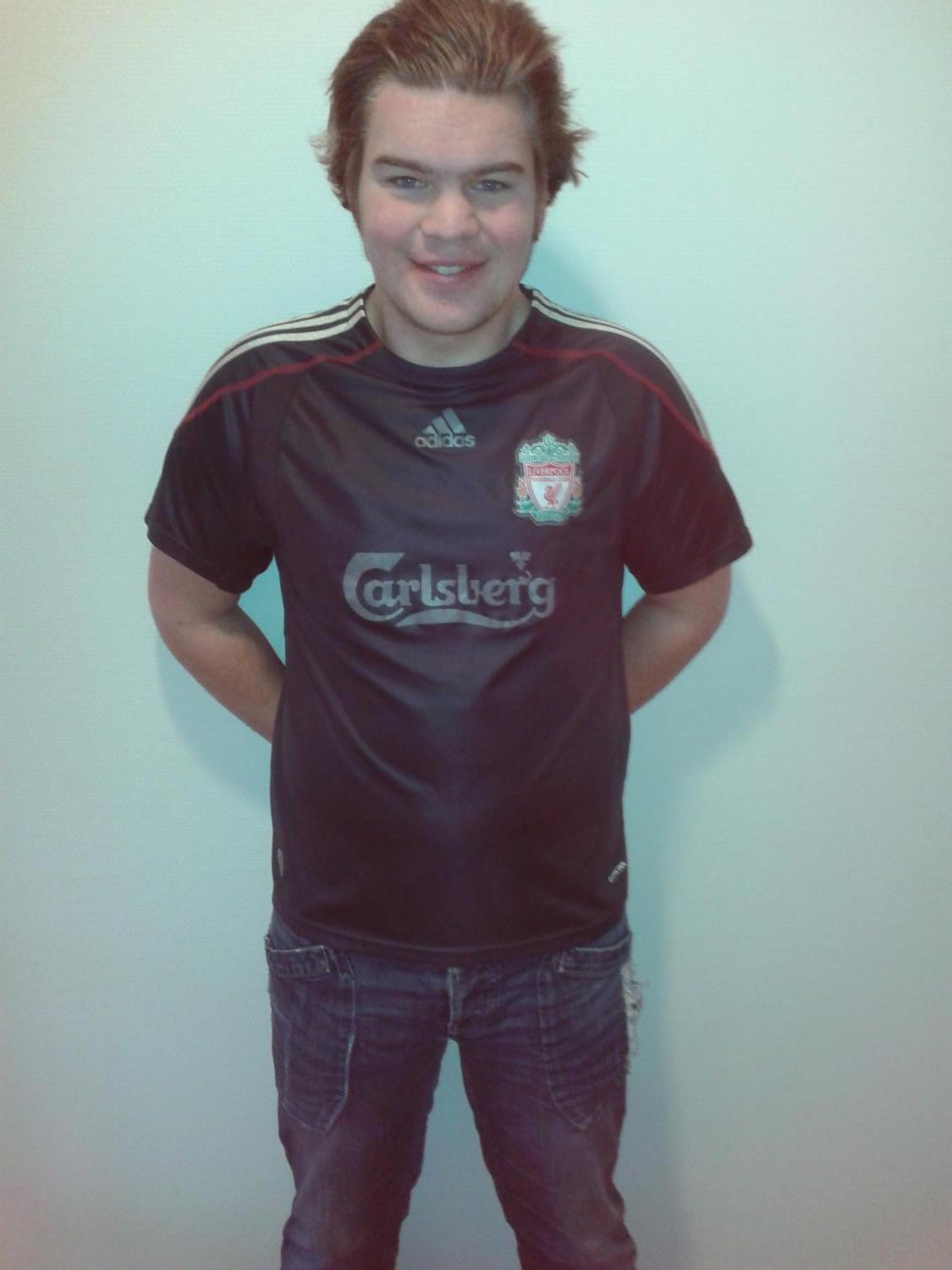 Liverpool Away football shirt 2009 - 2010. Sponsored by Carlsberg