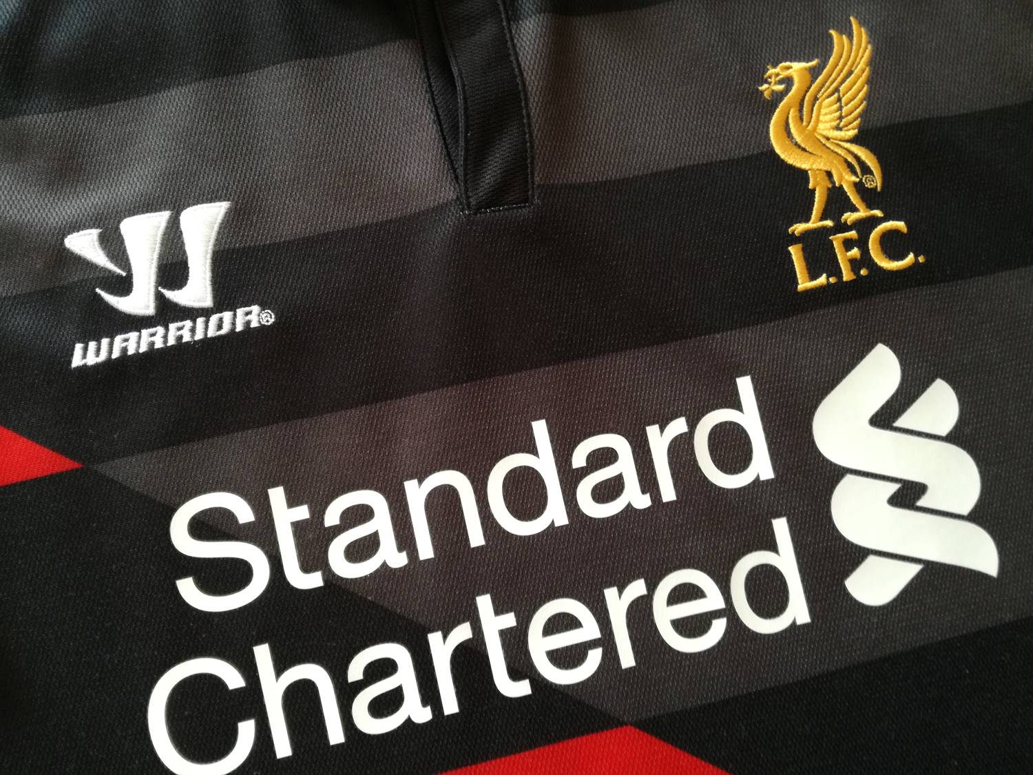 Liverpool Third football shirt 2014 - 2015. Sponsored by Standard Chartered