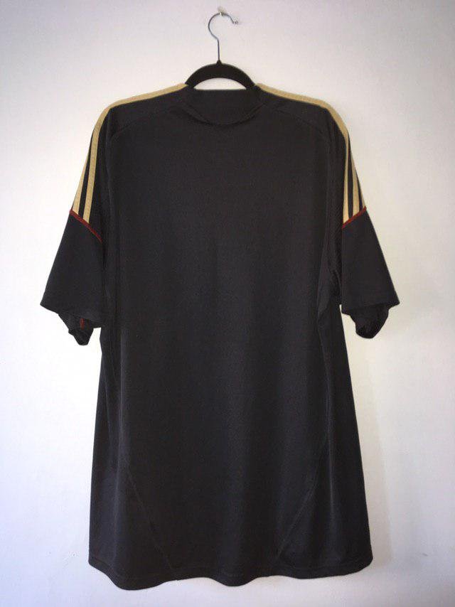 Liverpool Away football shirt 2009 - 2010. Sponsored by Carlsberg