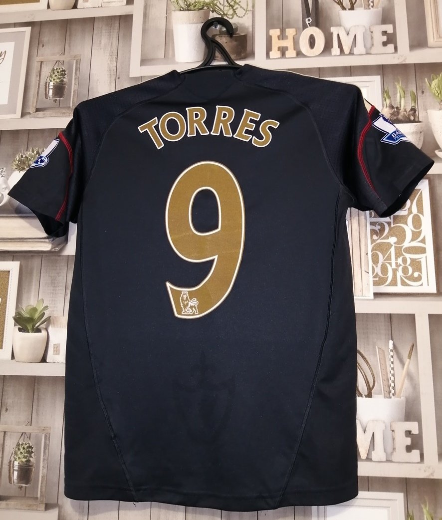 Liverpool Away football shirt 2009 - 2010. Sponsored by Carlsberg