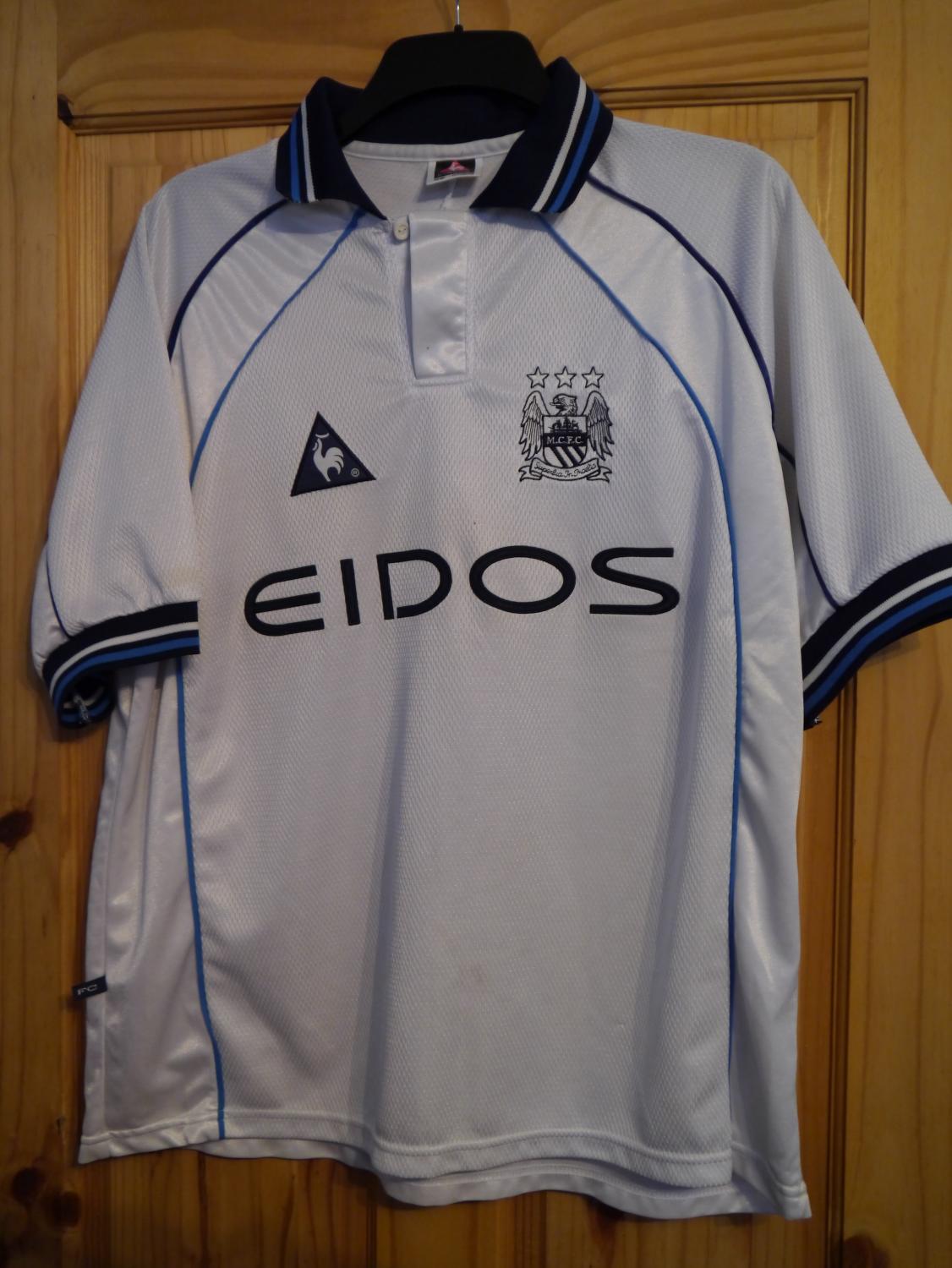 Manchester City Away football shirt 1999 - 2000. Sponsored by Eidos