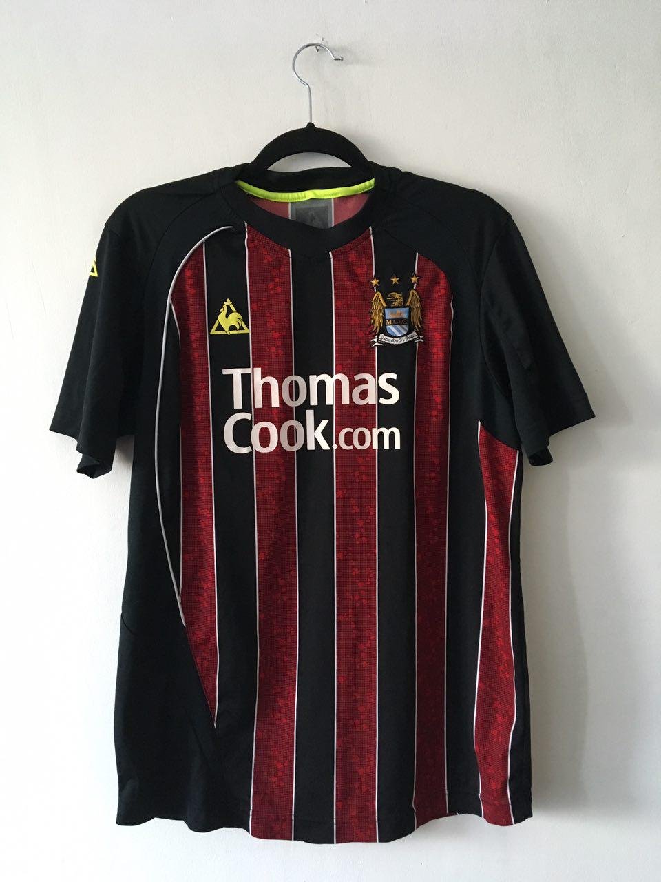 Manchester City Away football shirt 2008 - 2009. Sponsored by Thomas Cook