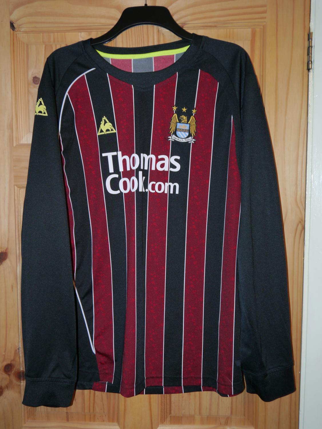 Manchester City Away football shirt 2008 - 2009. Sponsored by Thomas Cook