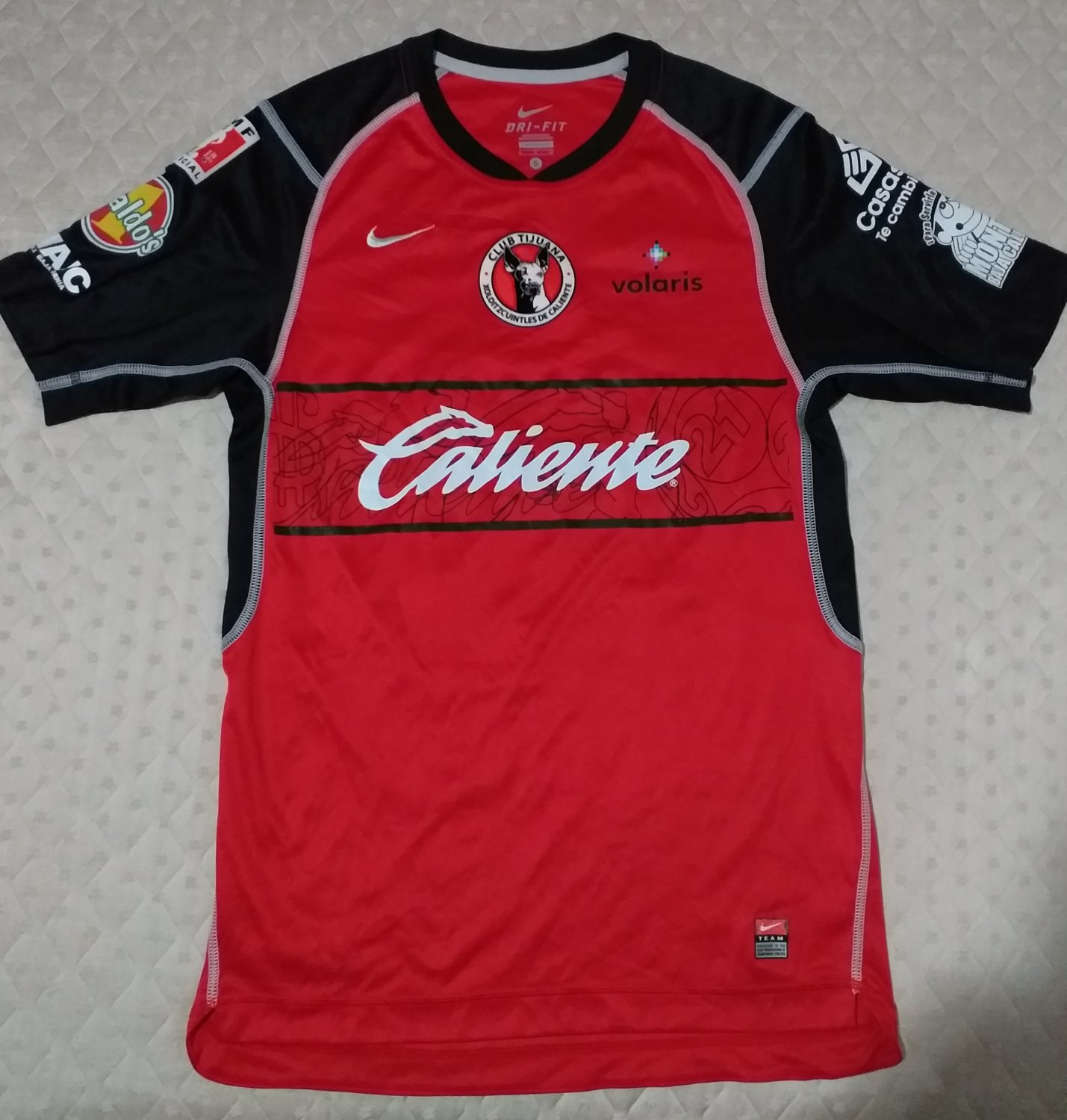 Club Tijuana Home football shirt 2011. Sponsored by Caliente