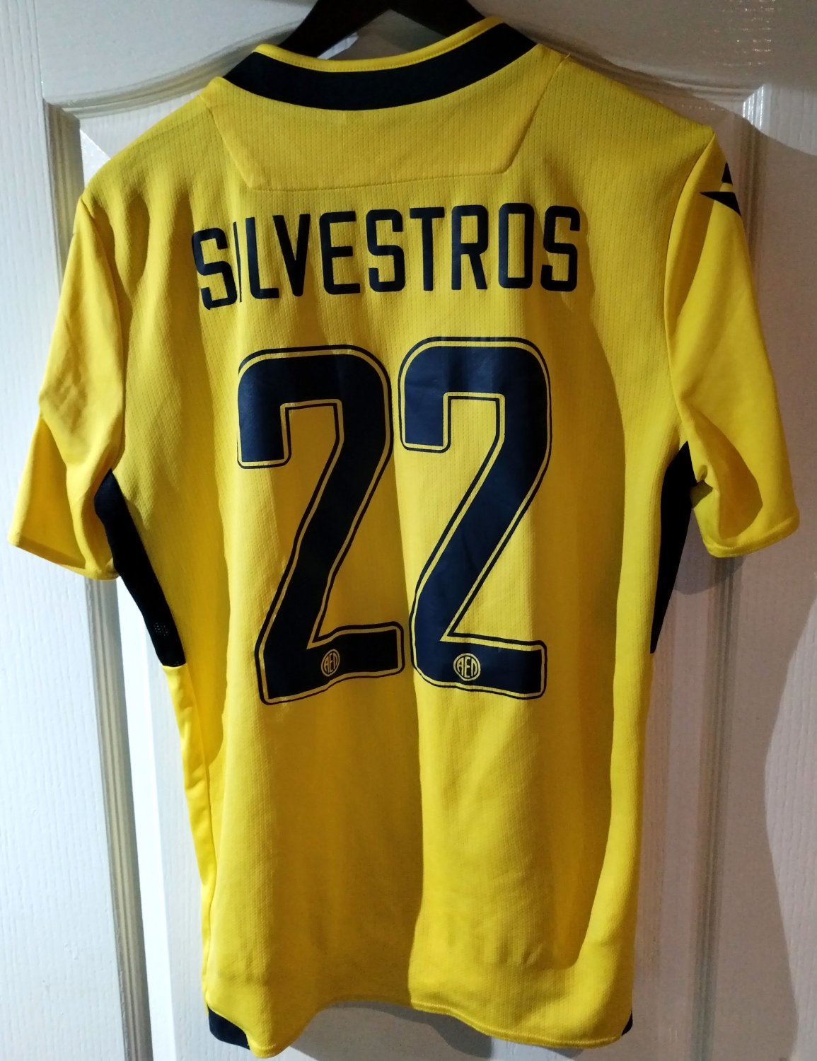 AEL Limassol Home football shirt 2022 - 2023. Sponsored by AK Foundation