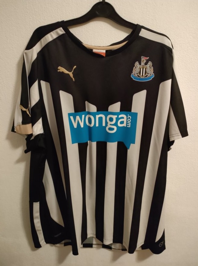 Newcastle Home football shirt 2014 - 2015. Sponsored by Wonga