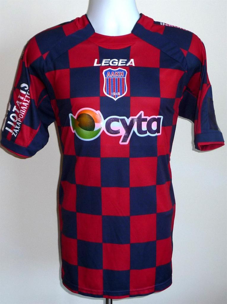 Alki Larnaca Home football shirt 2010 - ?. Sponsored by Cyta
