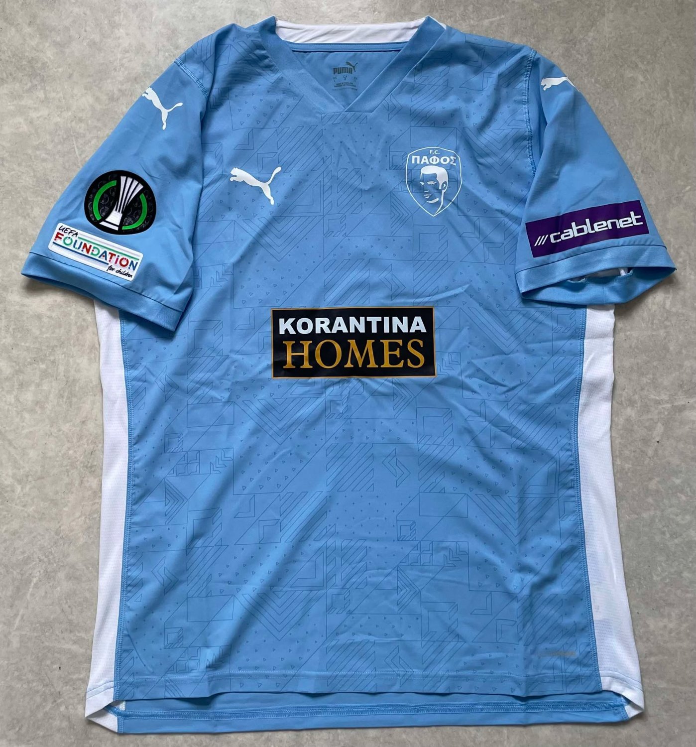 Pafos FC Home football shirt 2025. Sponsored by Korantina Homes