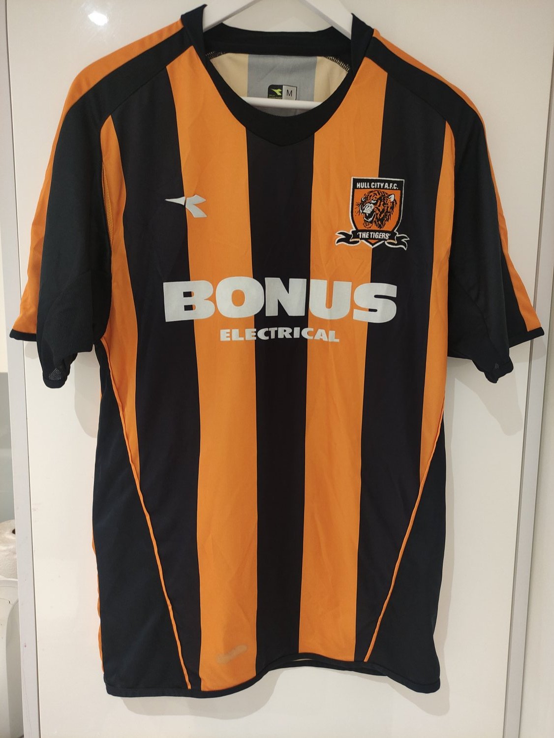 Hull City Home football shirt 2006 - 2007. Sponsored by Bonus Electrical