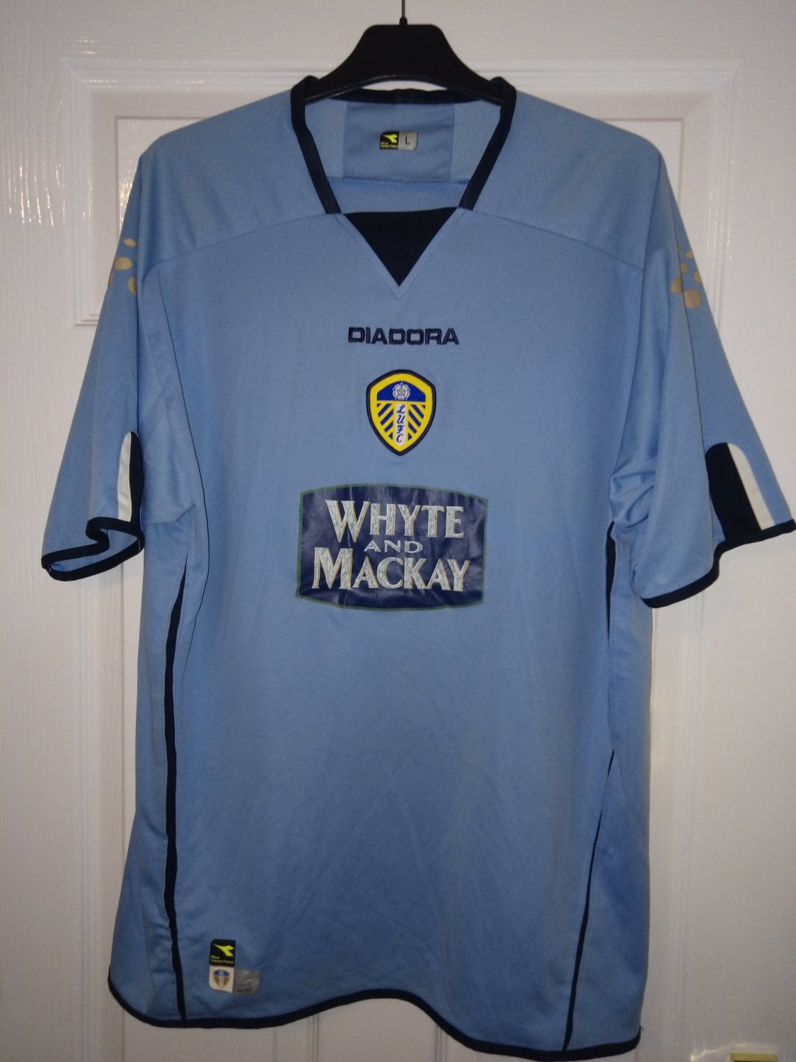 Leeds United Third football shirt 2004 - 2005. Sponsored by Whyte & Mackay
