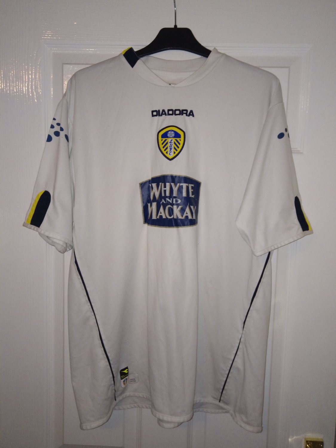 Leeds United Home football shirt 2004 - 2005. Sponsored by Whyte & Mackay