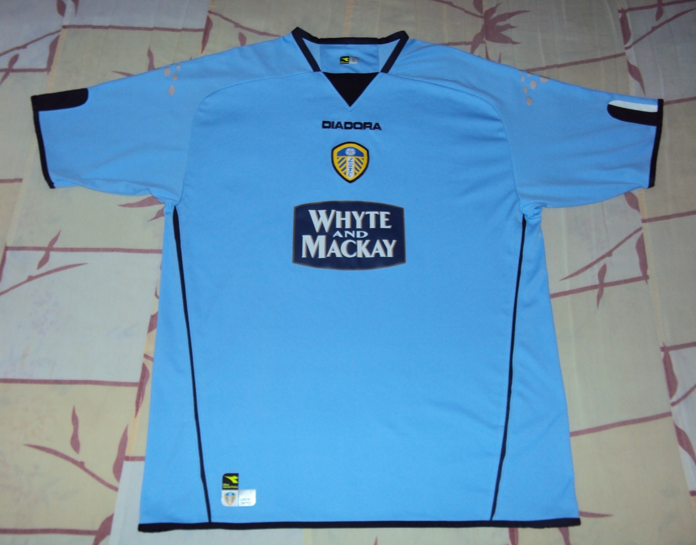 Leeds United Third football shirt 2004 - 2005. Sponsored by Whyte & Mackay