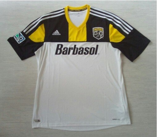 Columbus Crew Home football shirt 2012 - 2014. Sponsored by Barbasol