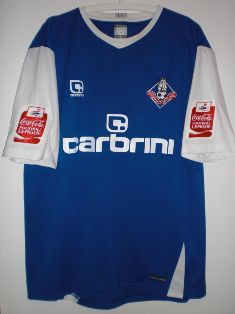 Oldham Athletic Home football shirt 2010 - 2012. Sponsored by Carbrini